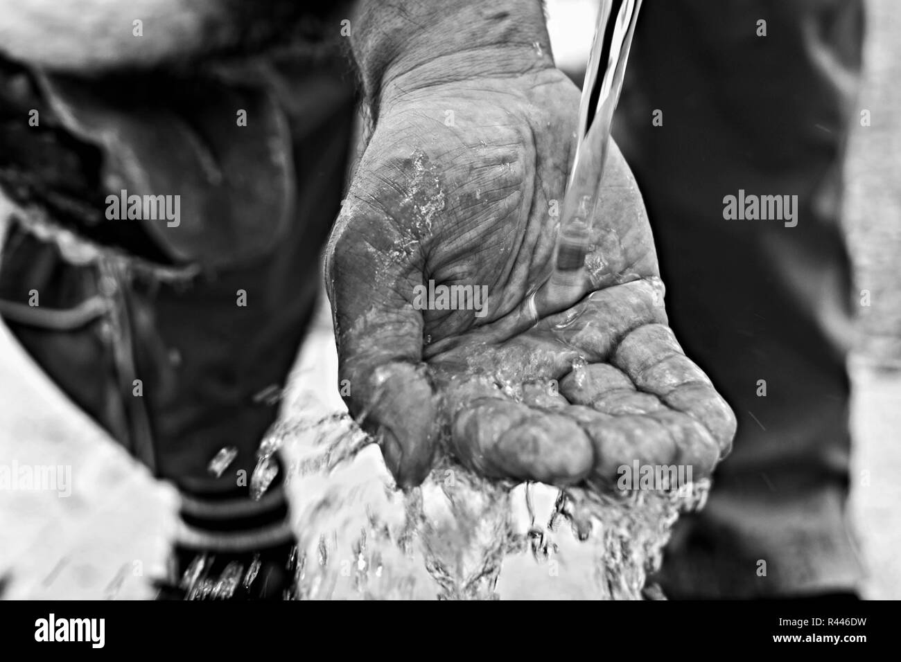 Hands catching light Black and White Stock Photos & Images - Alamy