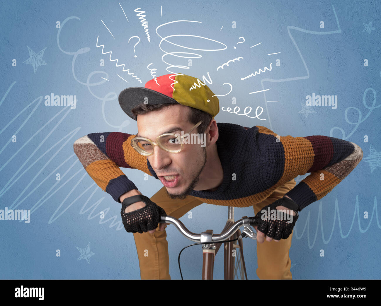Young foolish crazy rider with doodle on the background Stock Photo - Alamy