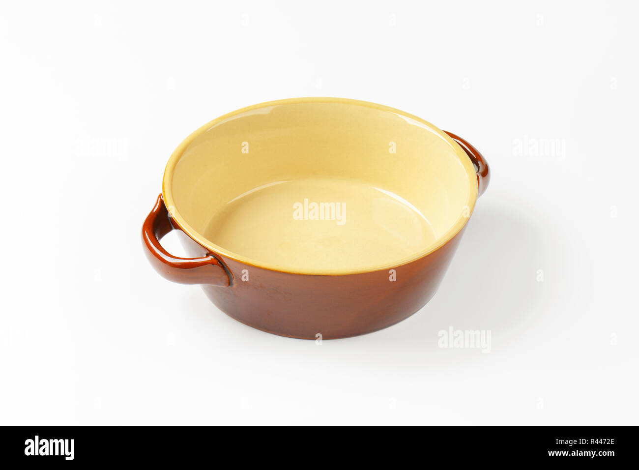 Round ceramic baking dish Stock Photo - Alamy