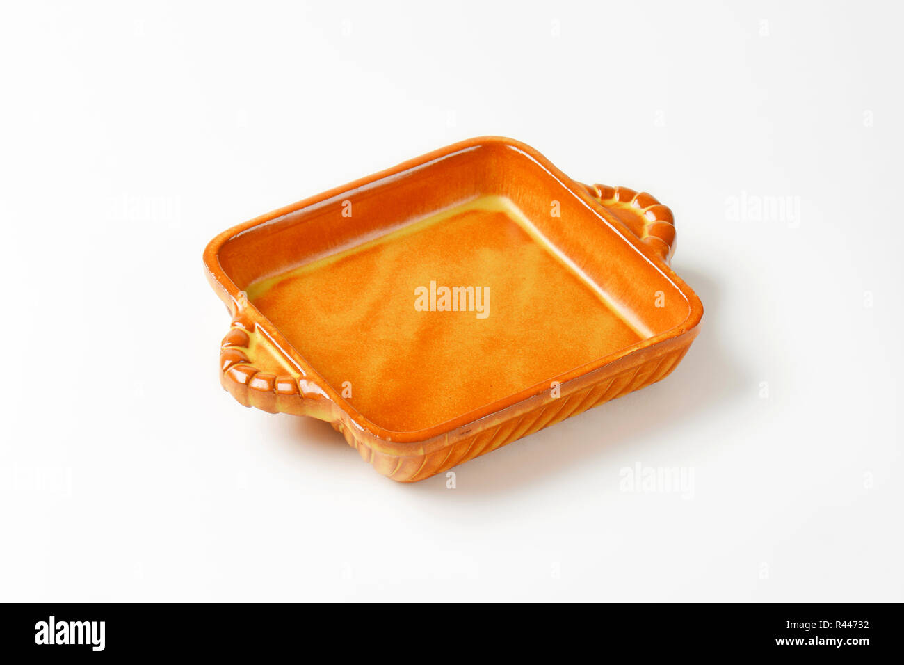 Square ceramic baking dish Stock Photo - Alamy