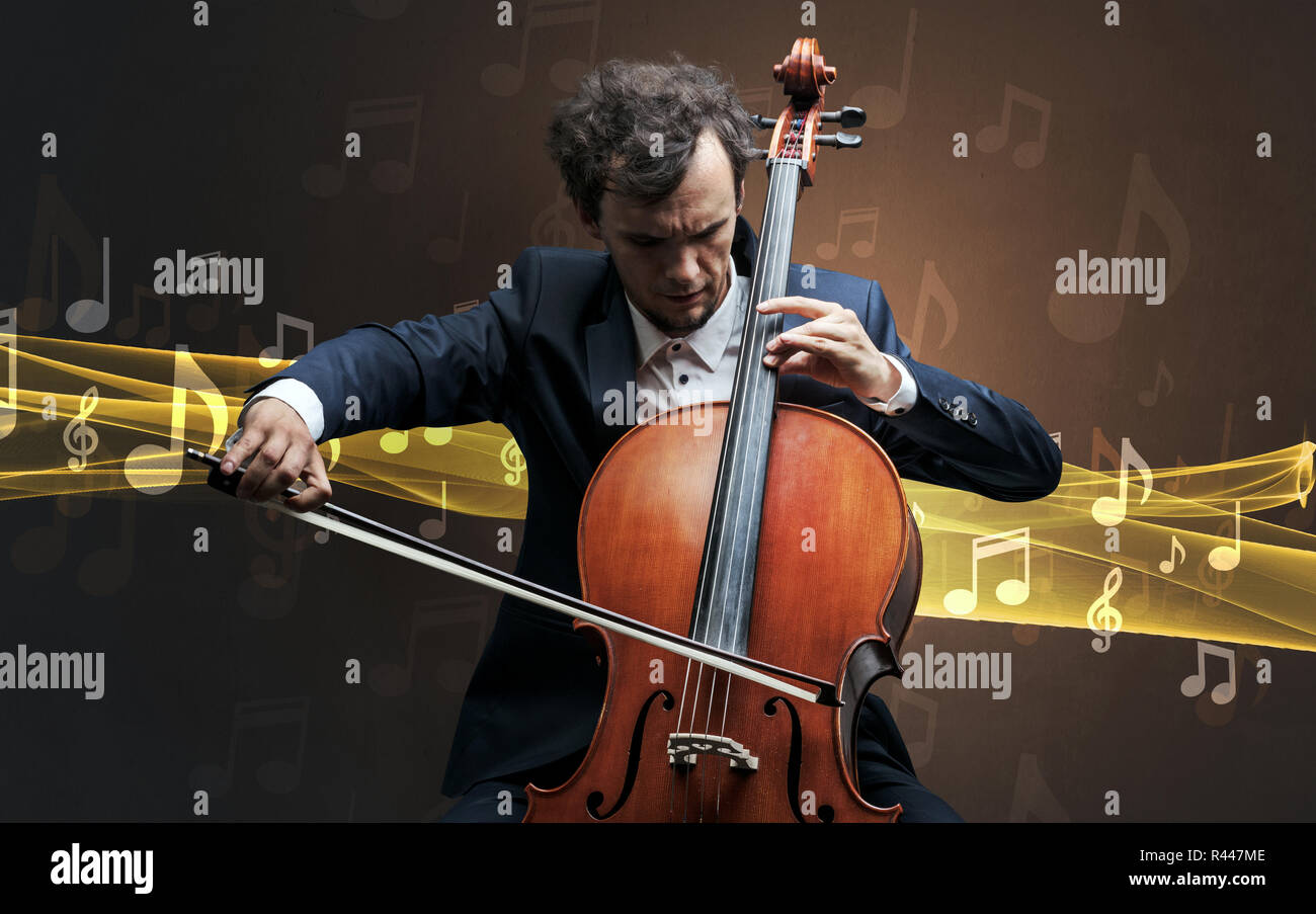 Young male musician playing on his cello with musical notes around ...