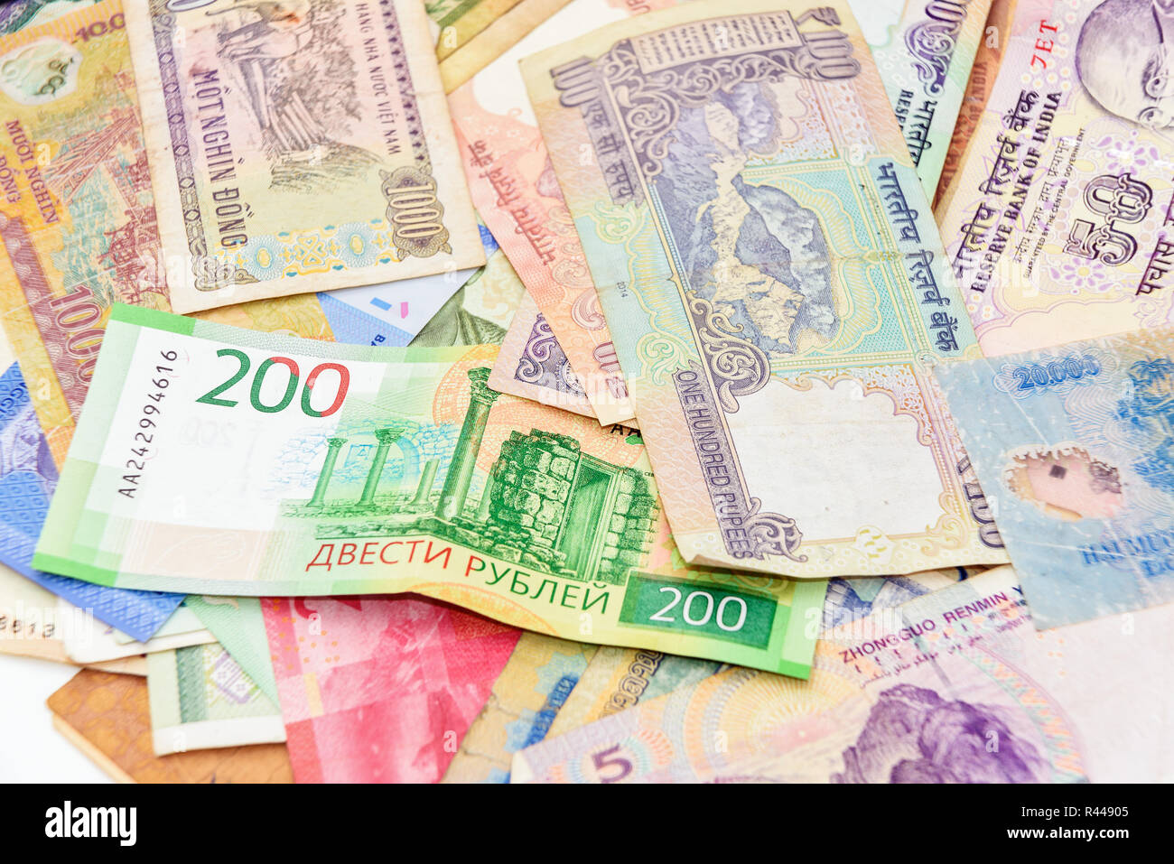 Cash money from different countries background Stock Photo - Alamy