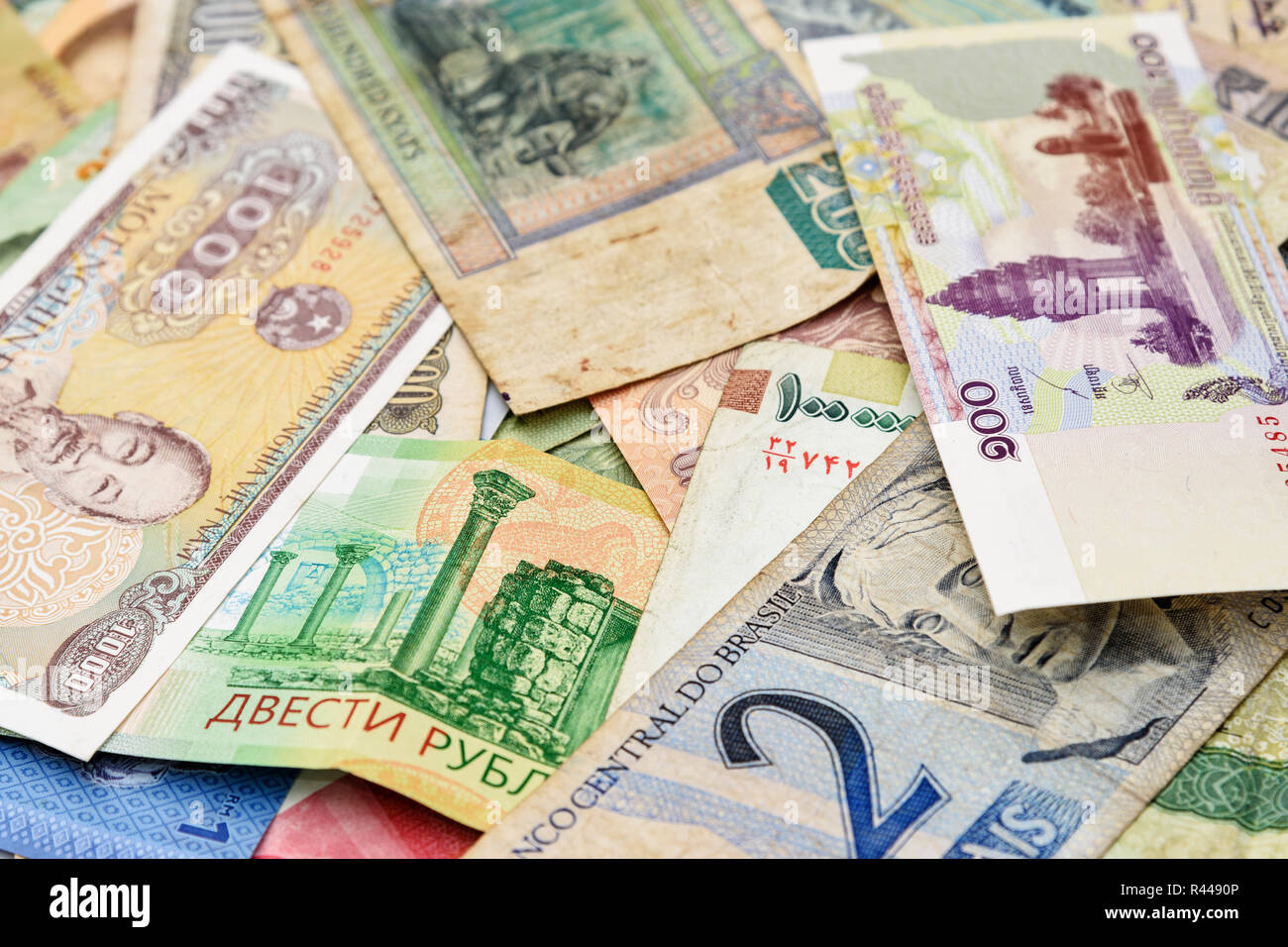 Cash money from different countries background Stock Photo - Alamy