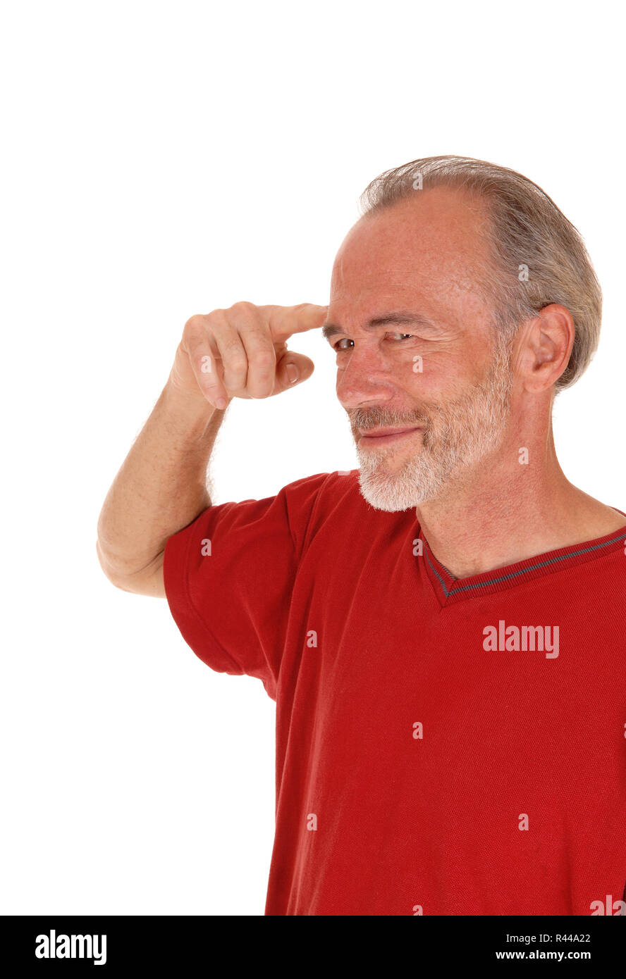 Middle age male pointing at forehead Stock Photo - Alamy