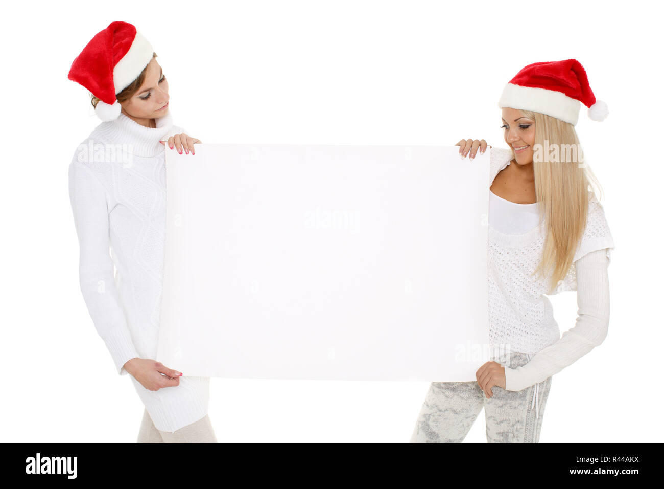 Young women with empty board for the text Stock Photo - Alamy