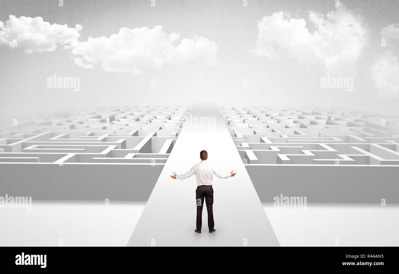 Businessman going straight ahead on a wide road between mazes Stock ... Businessman going straight ahead on a wide road between mazes Stock ...