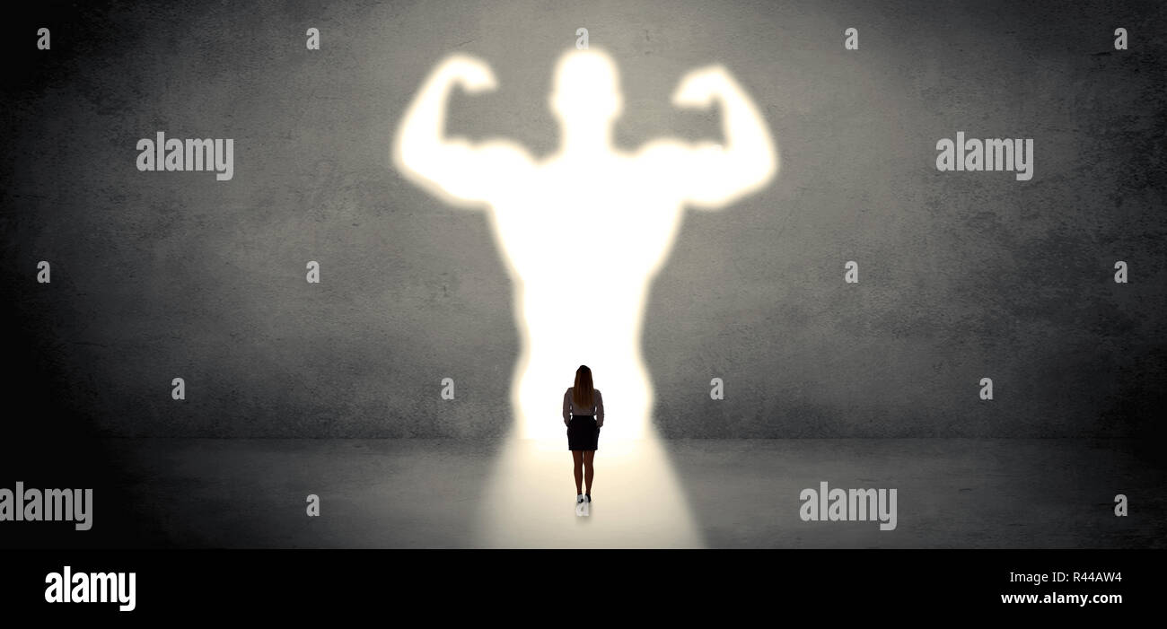 Woman standing and dreaming about a strong superhero Stock Photo - Alamy Woman standing and dreaming about a strong superhero Stock Photo - Alamy