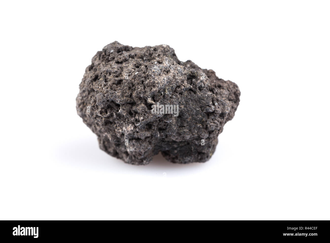 Volcanic stones on a white background Stock Photo - Alamy