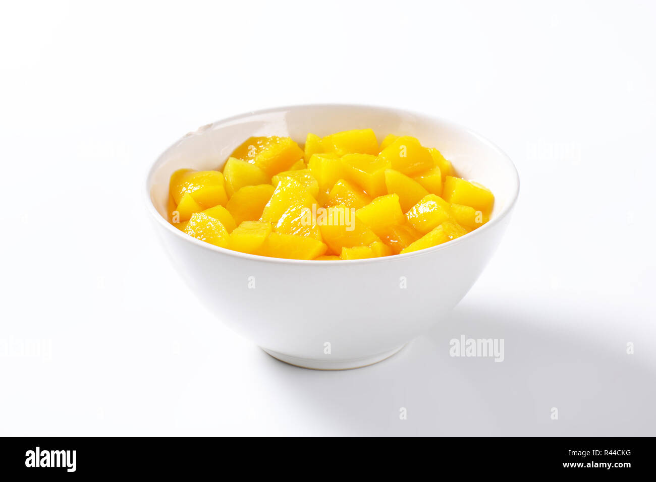 Canned peach pieces Stock Photo - Alamy
