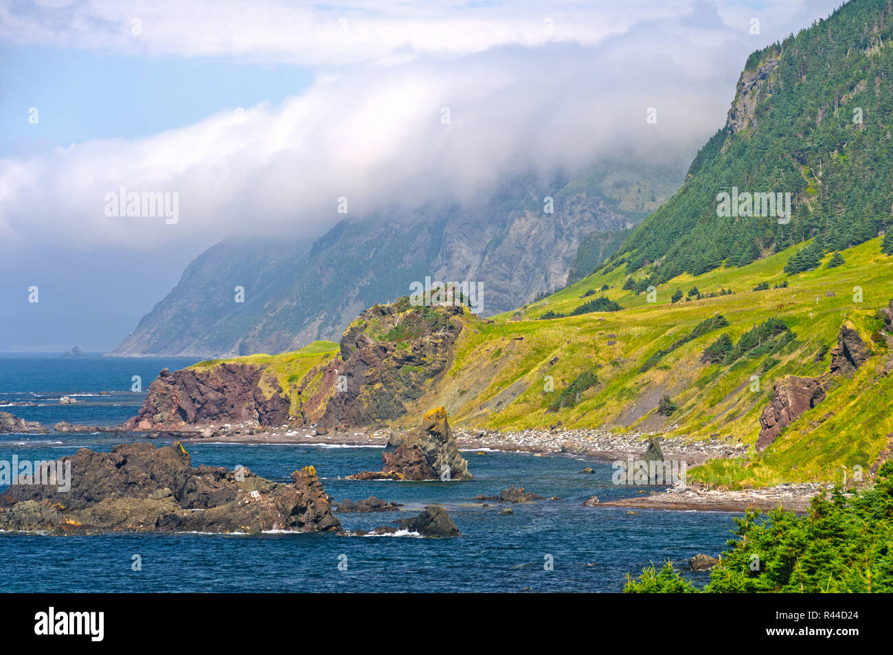 Clouds and Crags along an Ocean Coast Stock Photo - Alamy