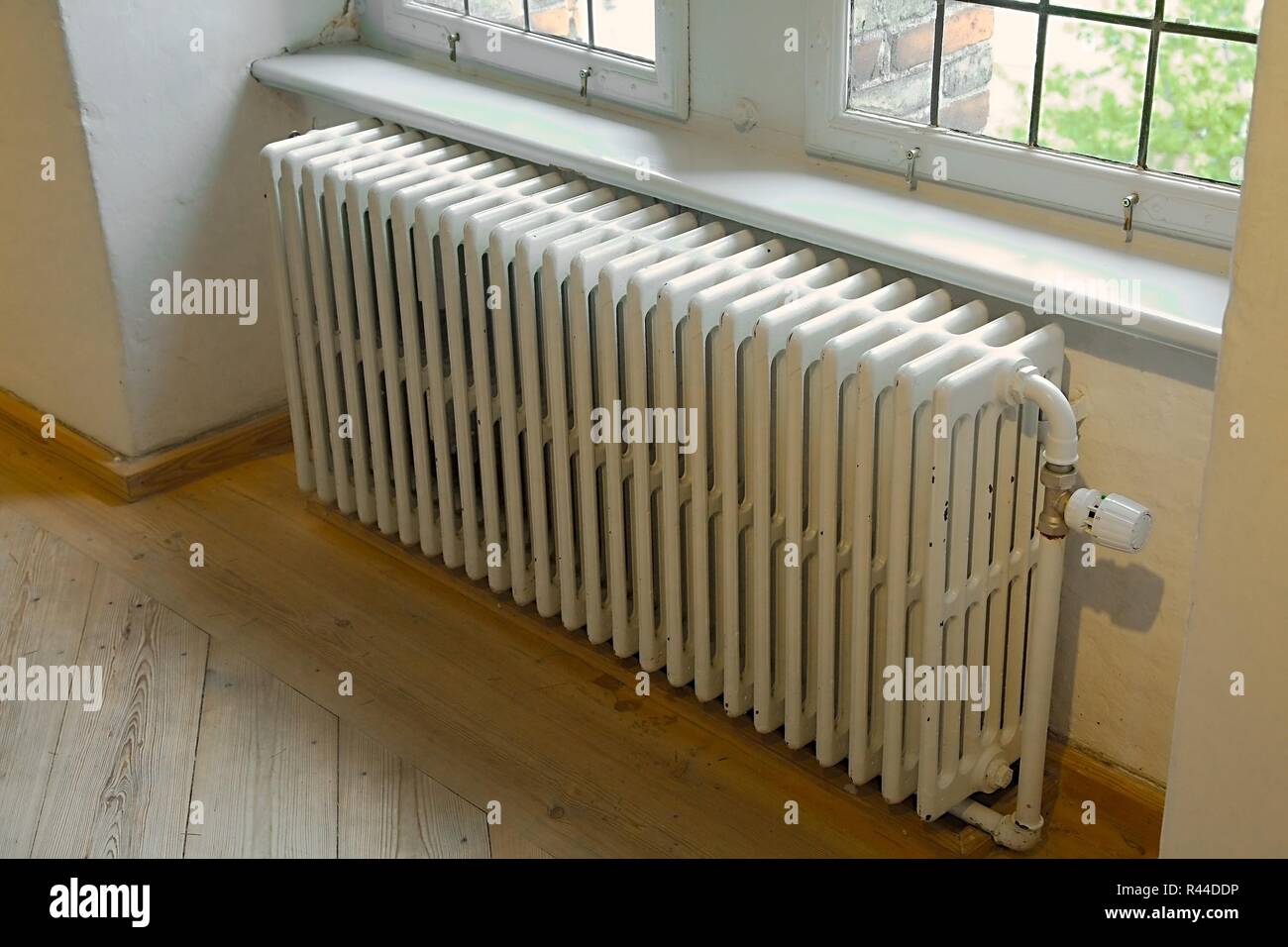 Old radiator heating hot water hi-res stock photography and images - Alamy