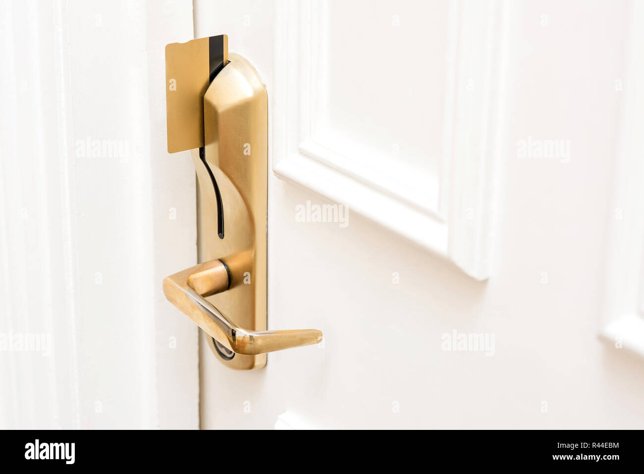 Card key inserted in modern door lock Stock Photo - Alamy