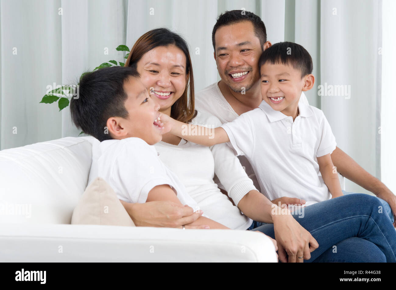 Asian father son hug hi-res stock photography and images - Alamy