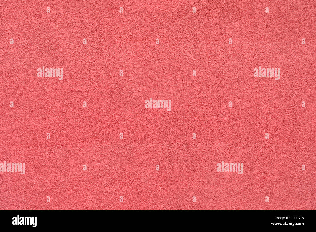 pinky red rough concrete wall texture background Stock Photo - Alamy