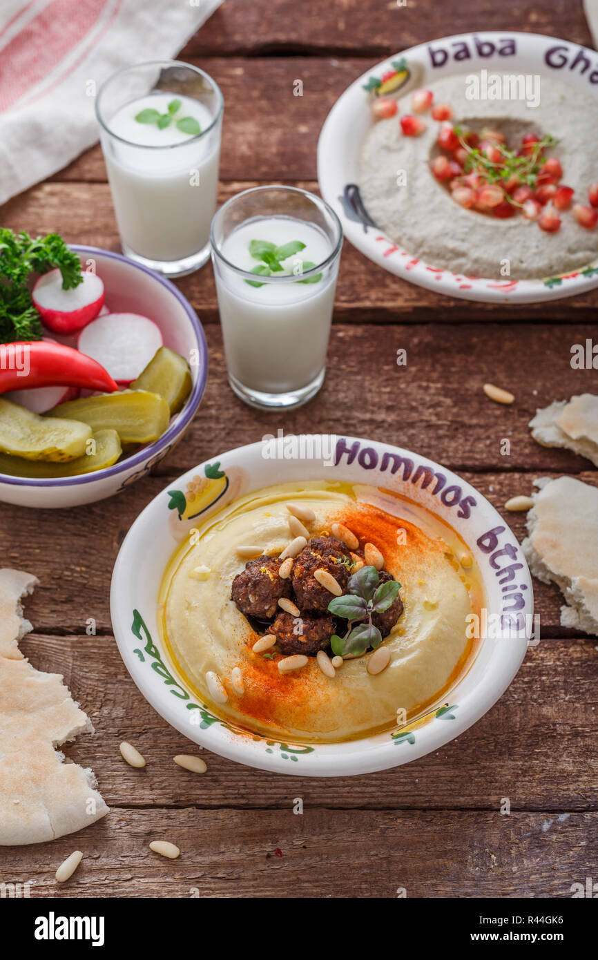 Traditional lebanon appetizers hummus, baba ganoush, vegetables and ...