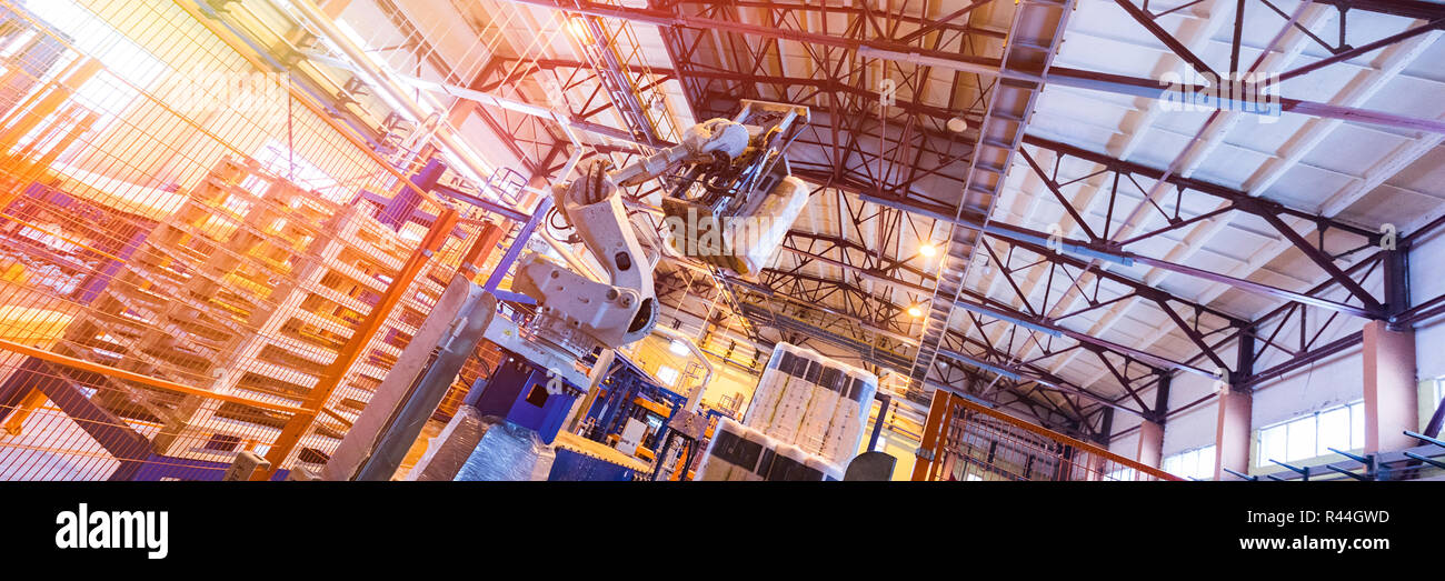 Fiberglass production industry equipment at manufacture background ...