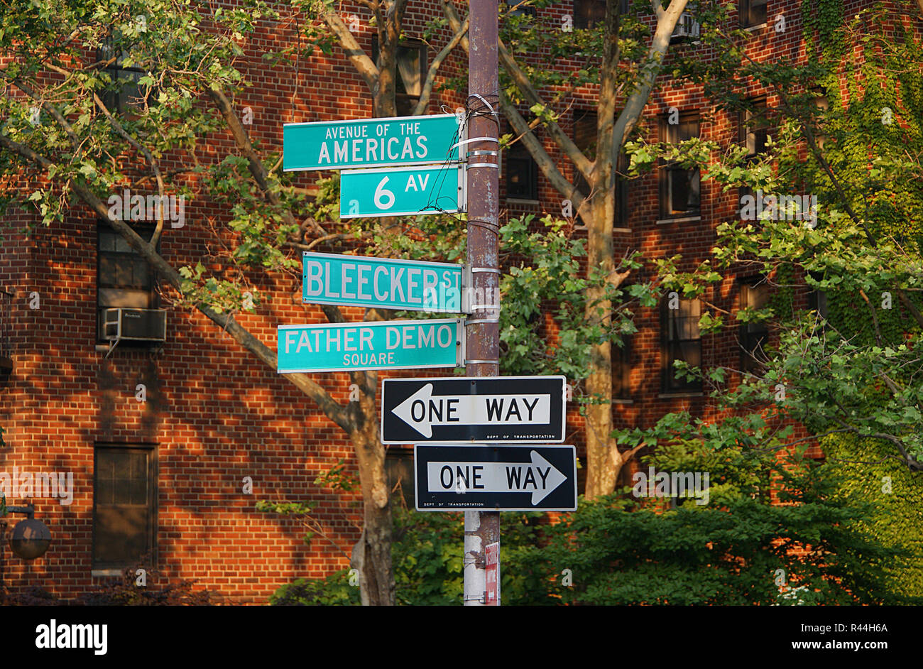 Street sign for Avenue of the Americas, 6th Ave, Blecker Street, Father ...