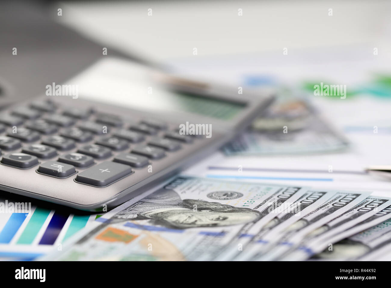 Silver calculator with gray keyboard is lying Stock Photo - Alamy