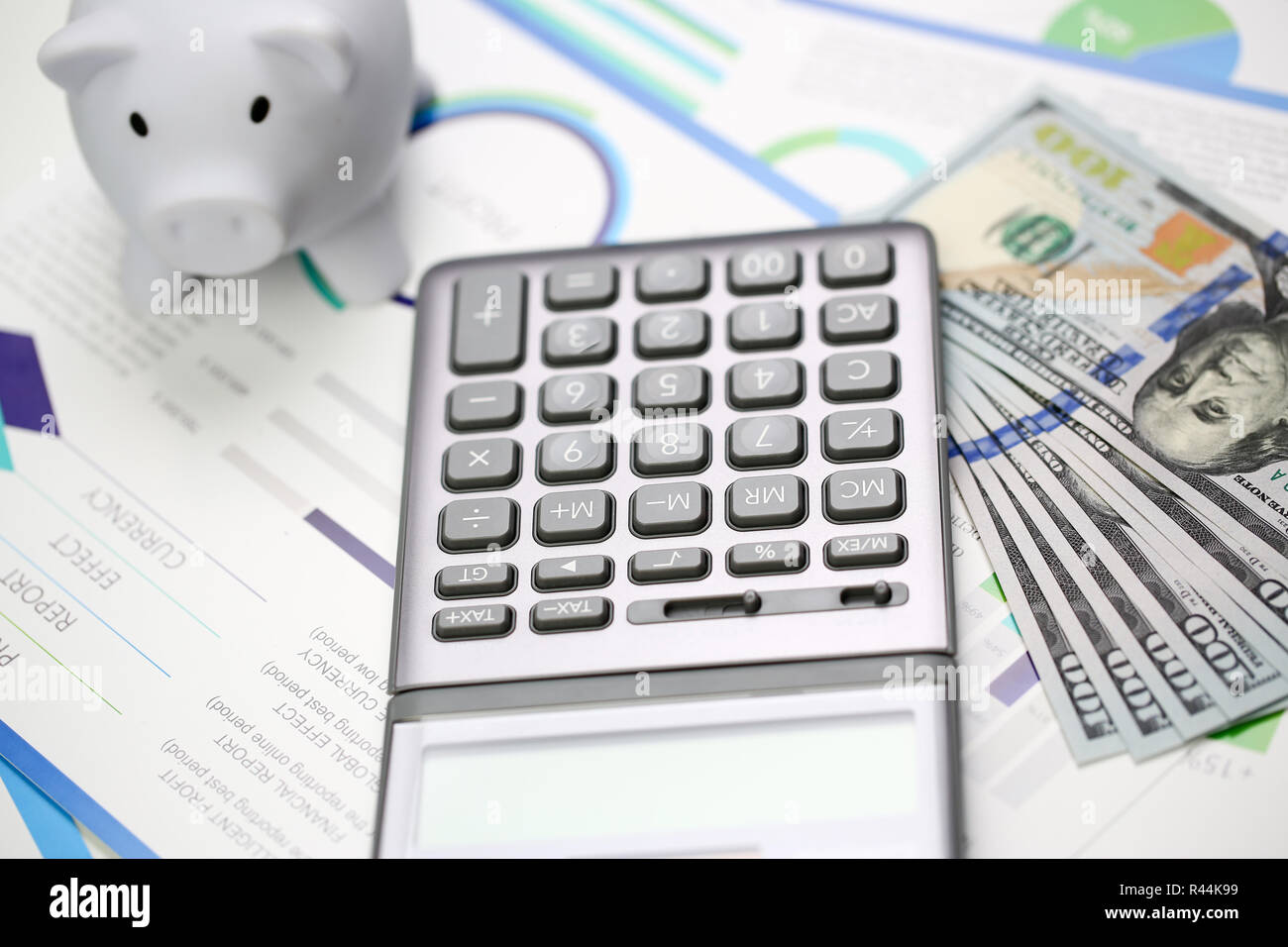 Silver calculator with gray keyboard is lying Stock Photo - Alamy