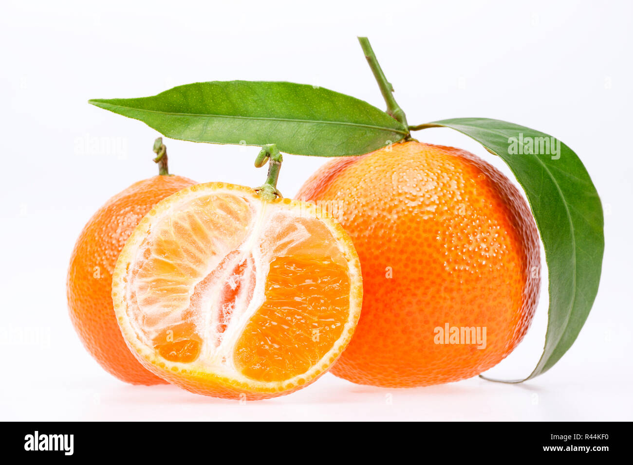 some fruits of clementine isolated on white background Stock Photo - Alamy