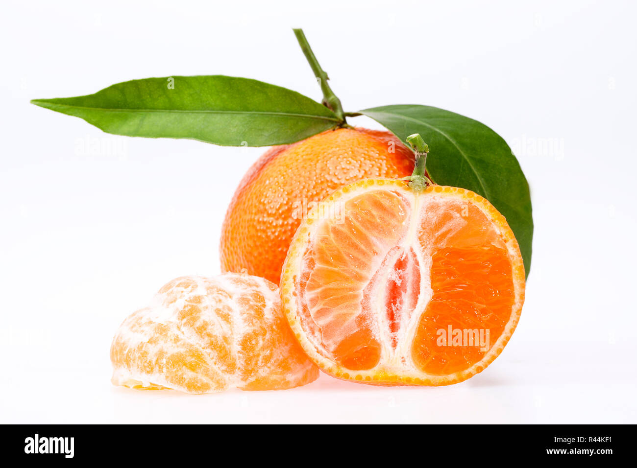 some fruits of clementine isolated on white background Stock Photo - Alamy