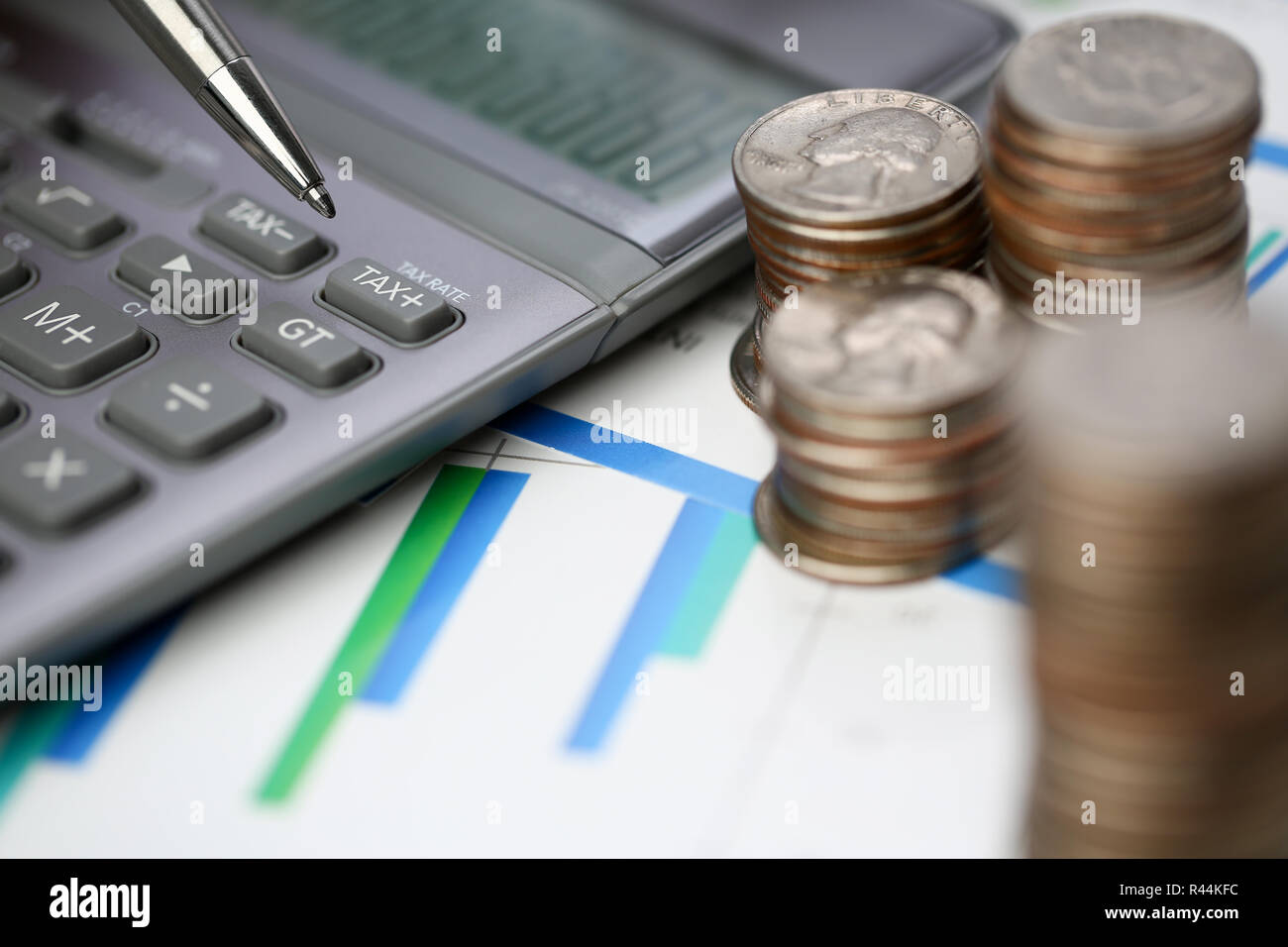 Silver calculator with gray keyboard is lying Stock Photo - Alamy