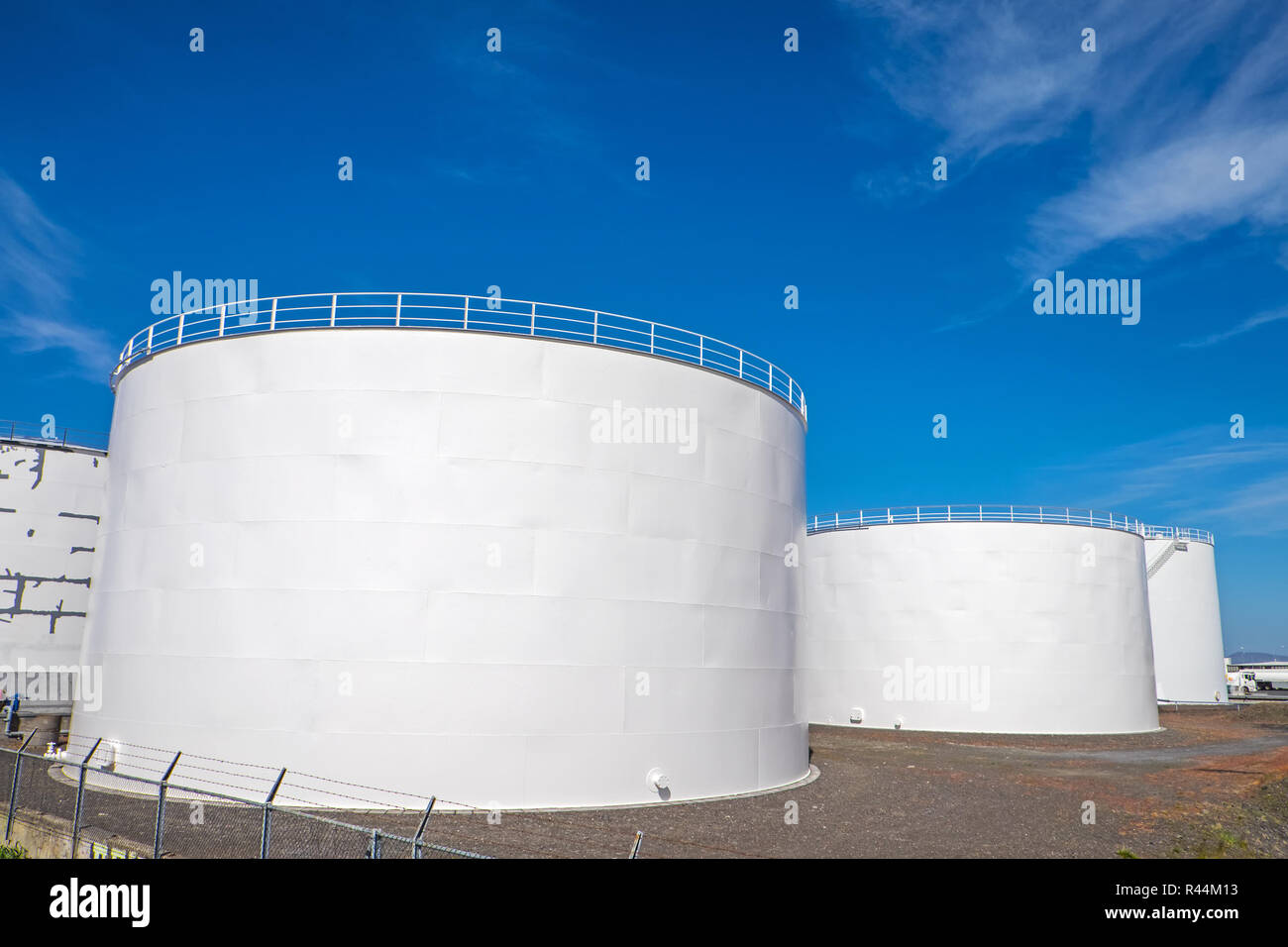 white gas tanks at the port of reykjavik,iceland Stock Photo - Alamy