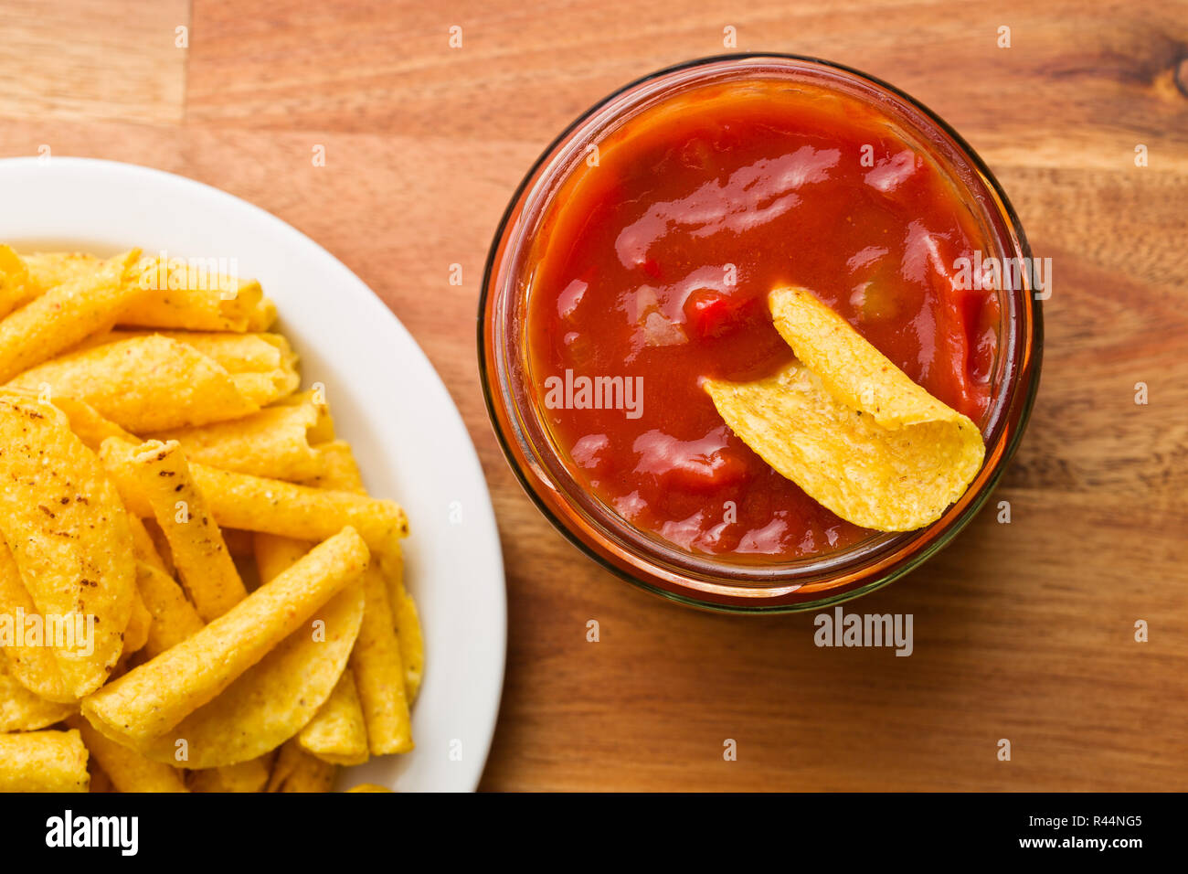 rolled nacho chips and salsa dip Stock Photo - Alamy