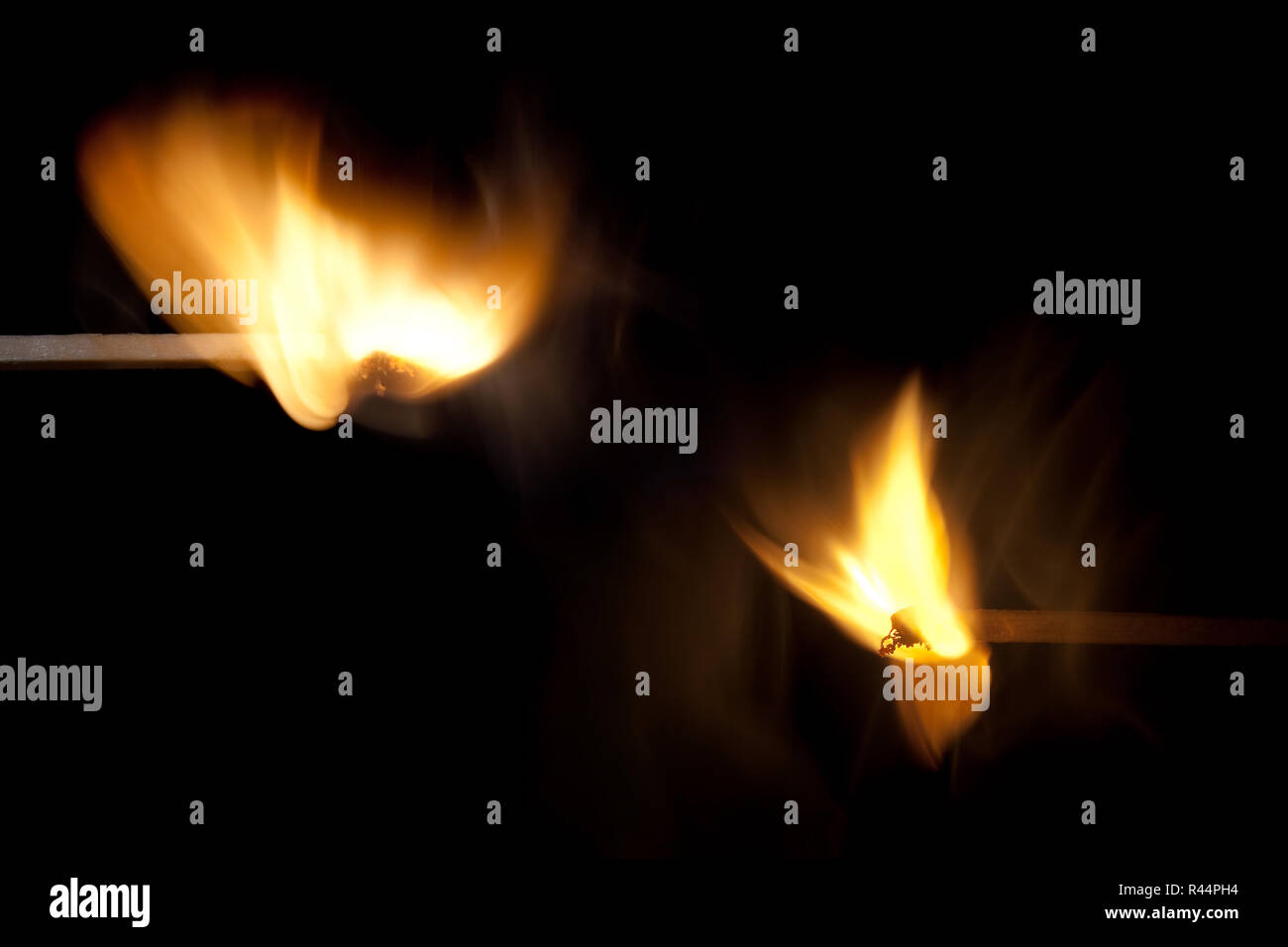 Two matches at the moment of ignition Stock Photo - Alamy