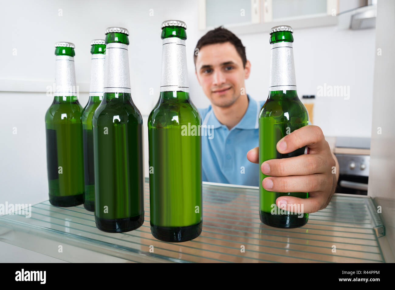 Man drinking from cooler bottle hi-res stock photography and images - Alamy