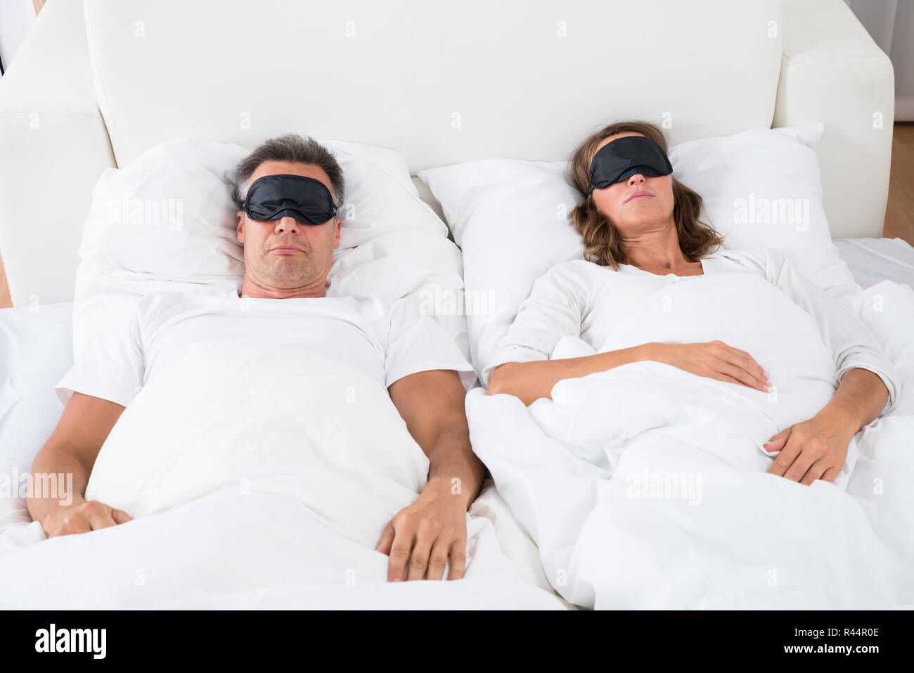 Man woman bed eye mask sleep hi-res stock photography and images - Alamy