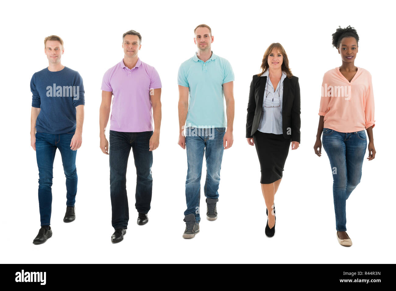 Creative Business People Walking With Manager Stock Photo - Alamy