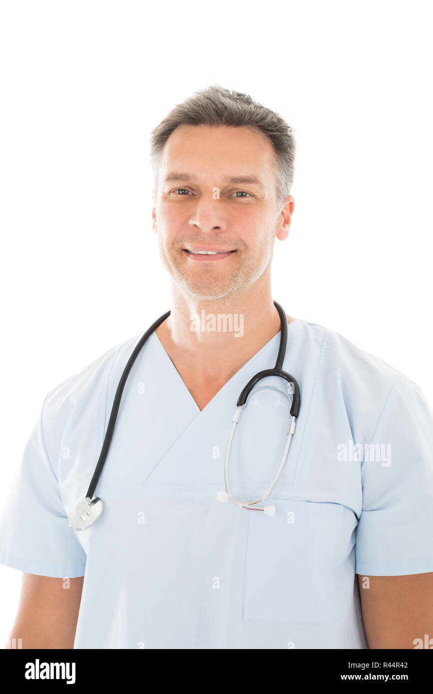 Happy Male Surgeon Against White Background Stock Photo - Alamy