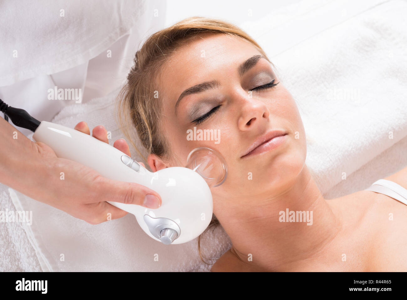 Woman Receiving Cellulite Vacuum Therapy On Face Stock Photo - Alamy