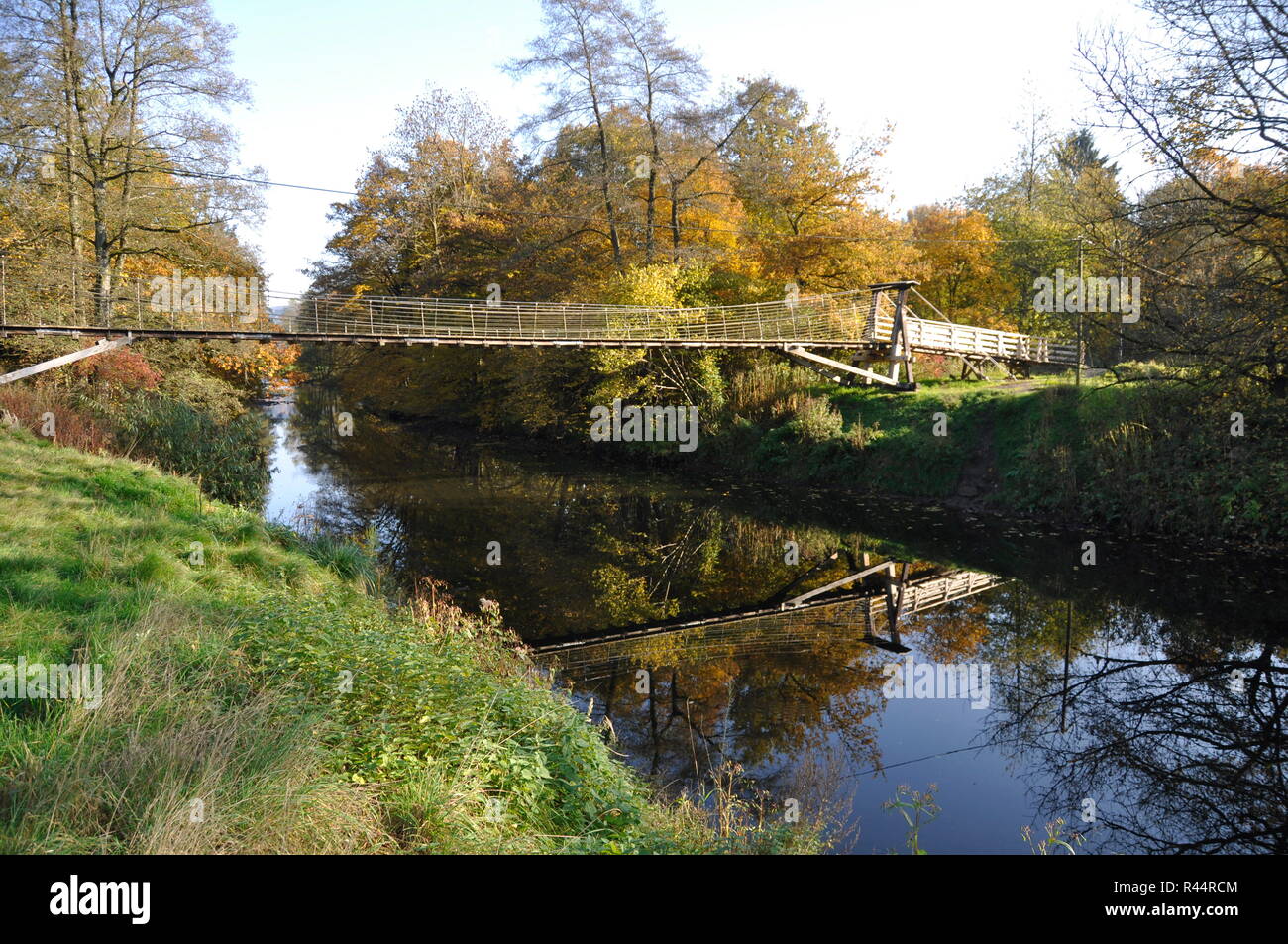 suspension bridge over the agger in oberbergi country Stock Photo - Alamy