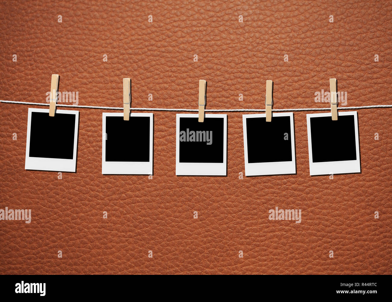 Hanging photo frame hi-res stock photography and images - Alamy