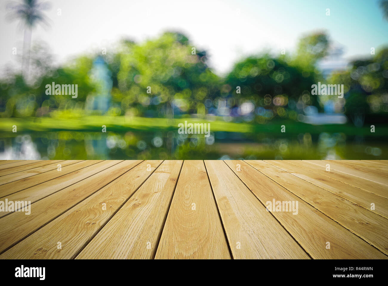 Perspective wood and bokeh light background Stock Photo - Alamy
