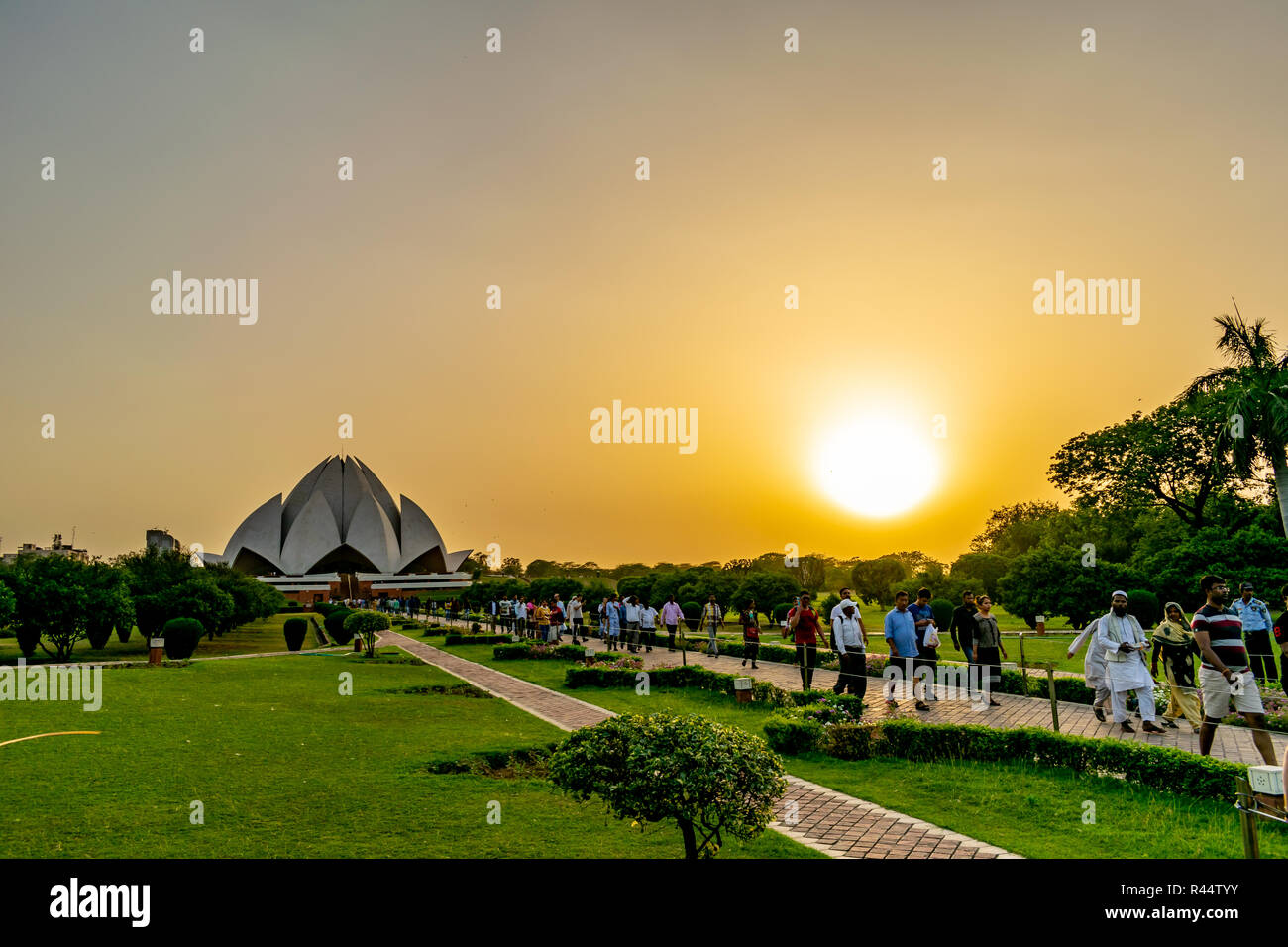 Sun setting behind temple hi-res stock photography and images - Alamy
