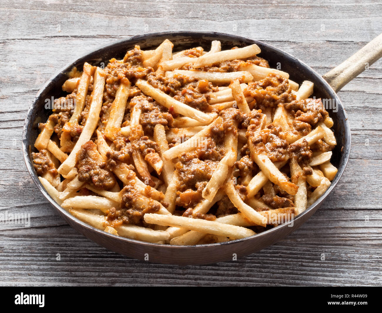 rustic american chili fries Stock Photo - Alamy