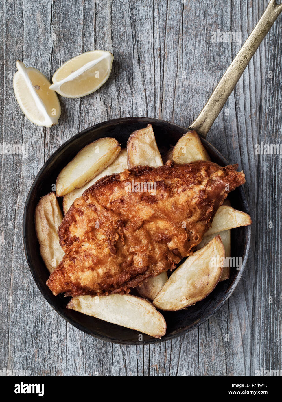 rustic traditional english fish and chips Stock Photo - Alamy
