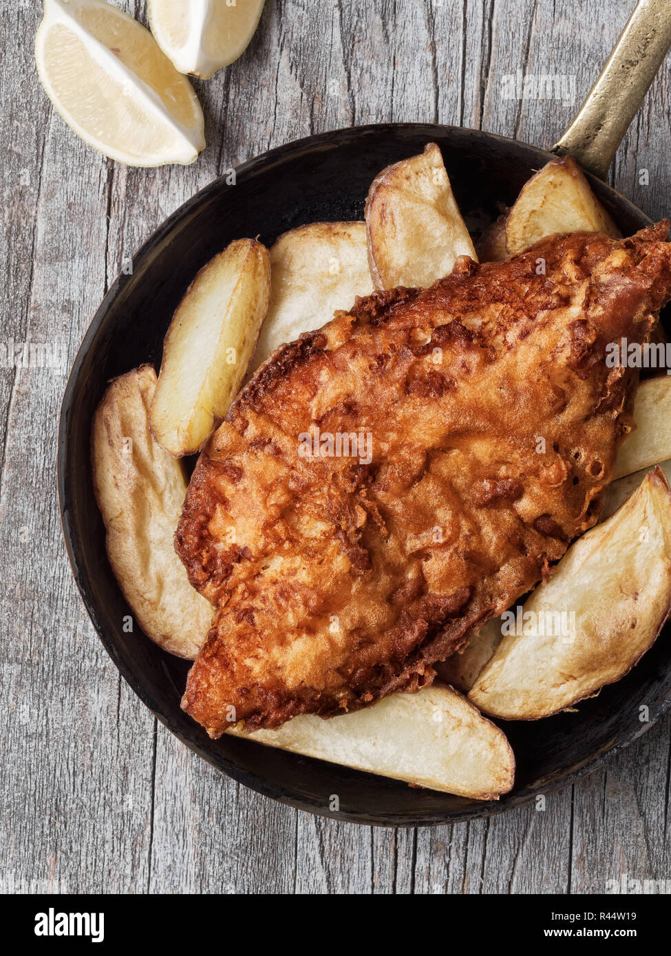 rustic traditional english fish and chips Stock Photo - Alamy