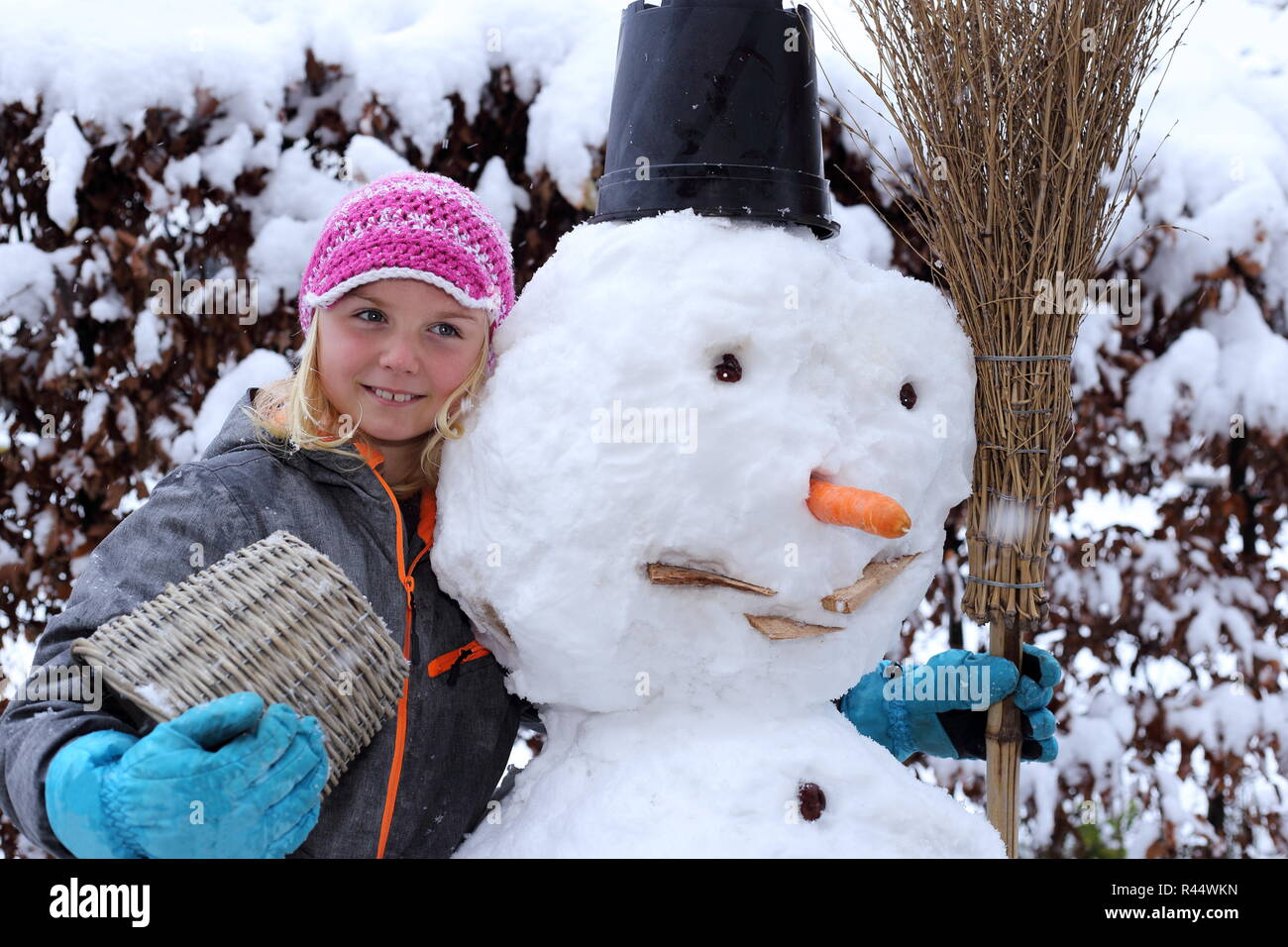 snowman with girl Stock Photo - Alamy
