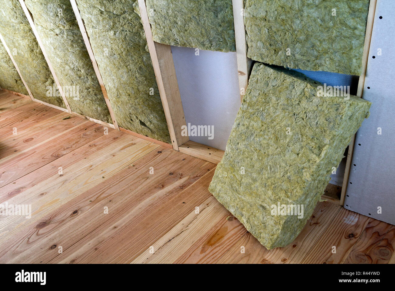 Wooden frame for future walls with drywall plates insulated with rock ...
