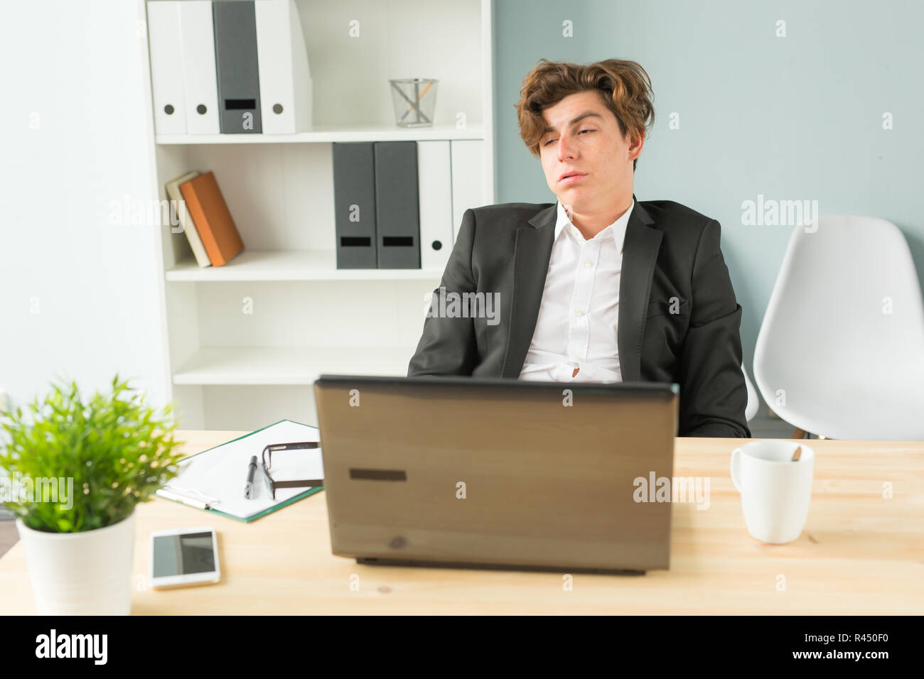 Humor, joke and business people concept - funny man tired after working ...