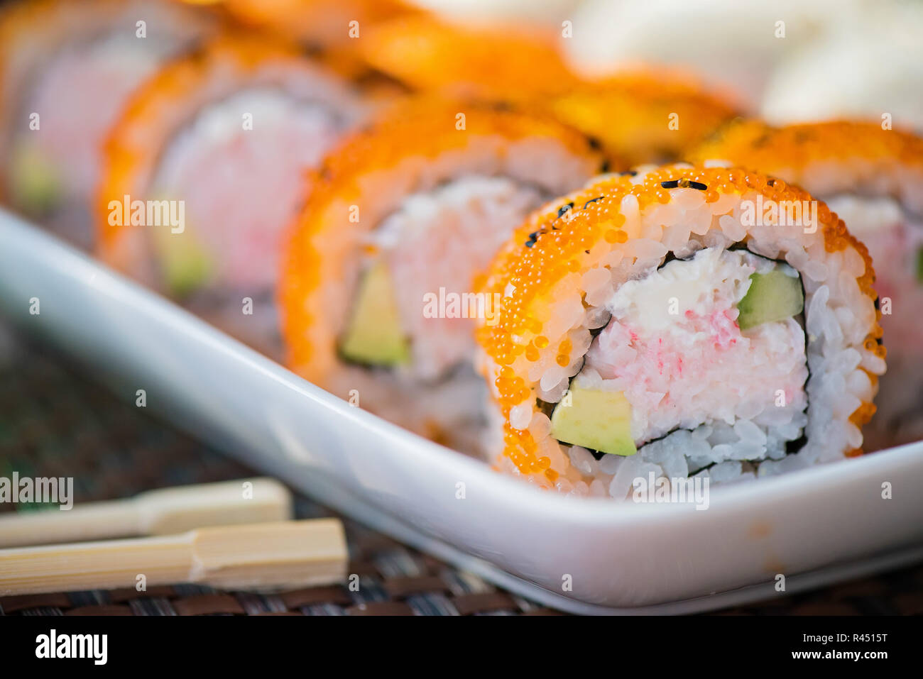 California maki sushi with orange masago Stock Photo - Alamy