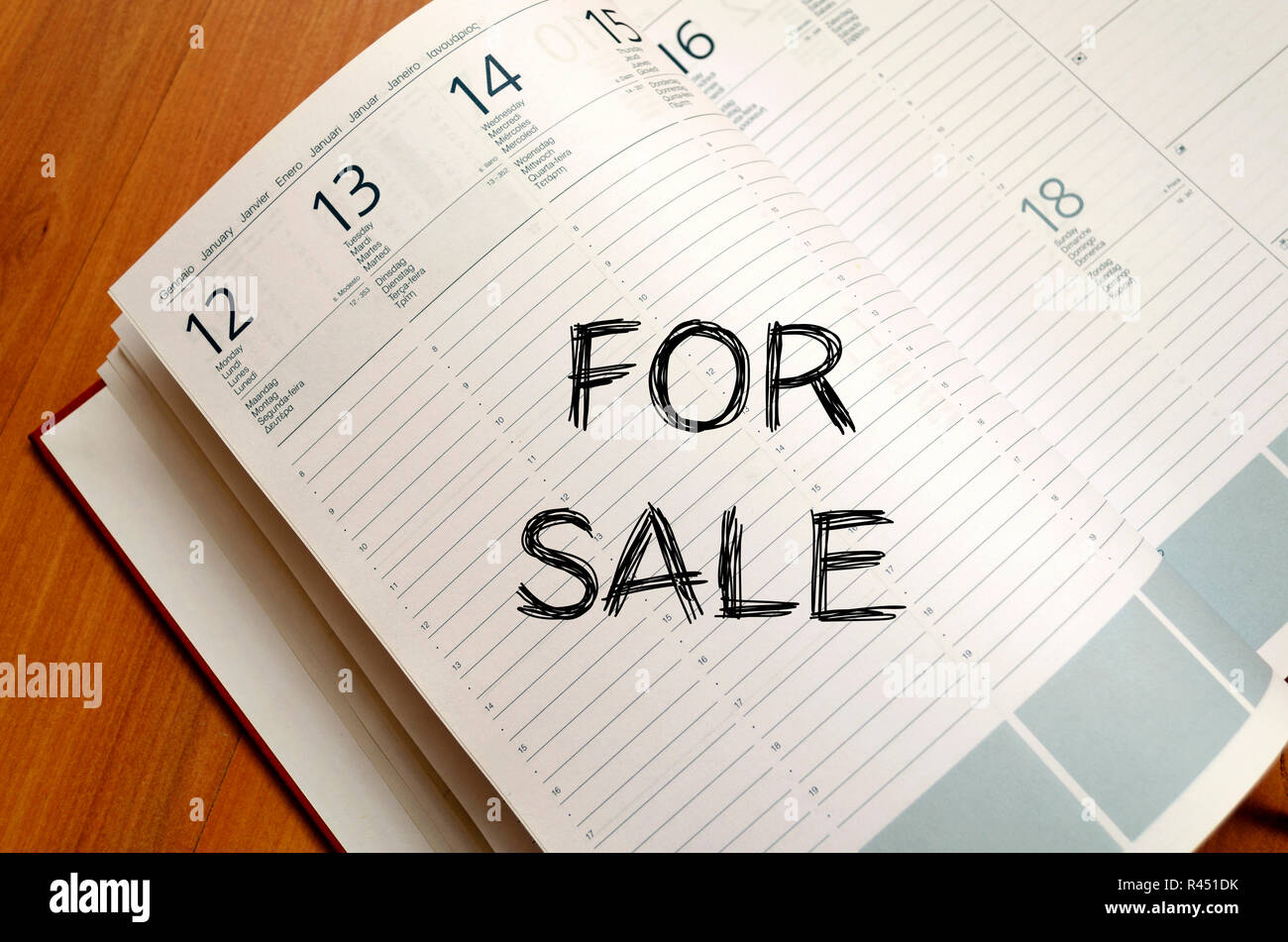 For sale write on notebook Stock Photo - Alamy