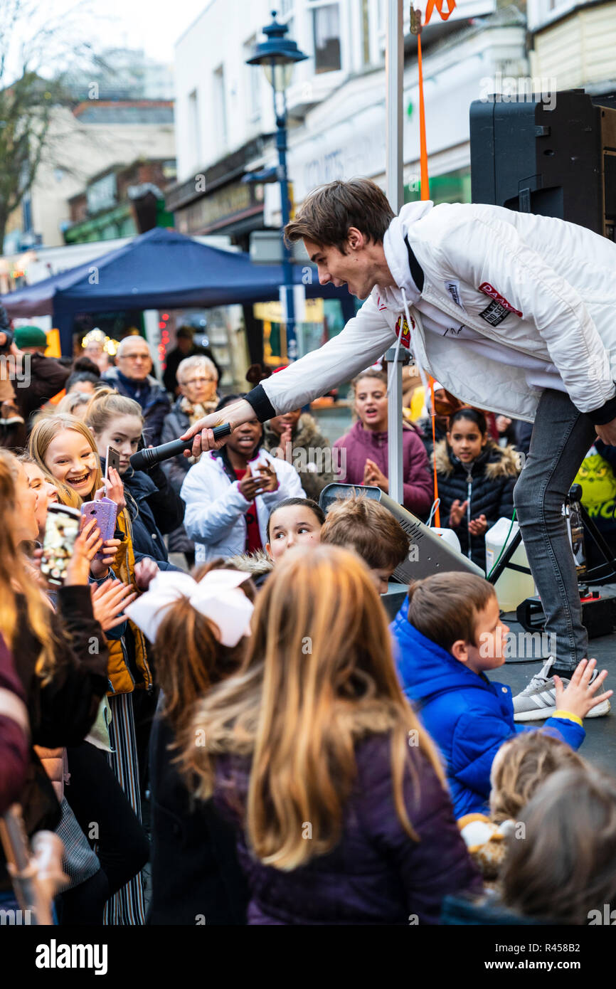 Young teenage man, signer, songwriter, Robbie White, on stage at open ...