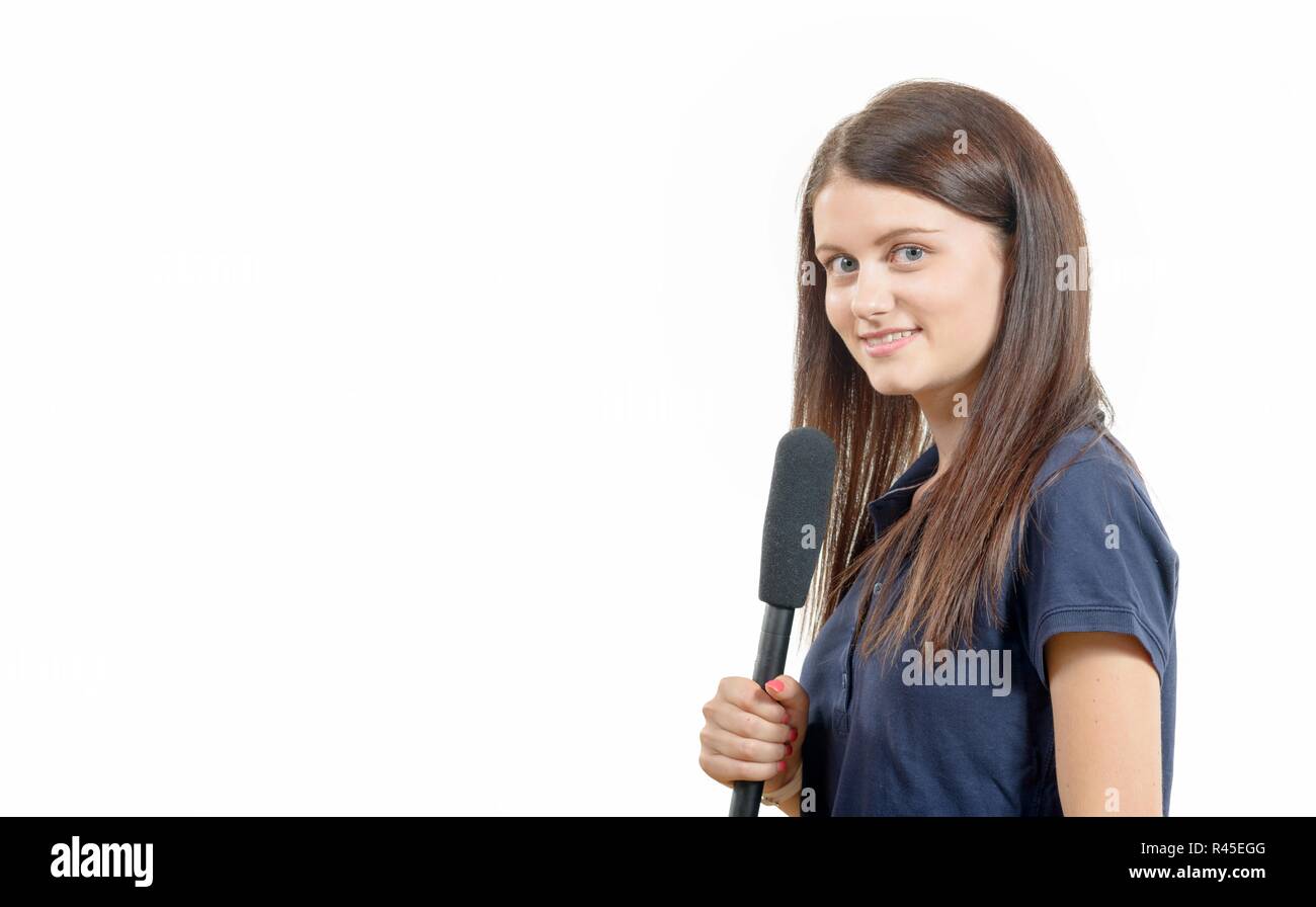 a young woman journalist with a microphone Stock Photo - Alamy