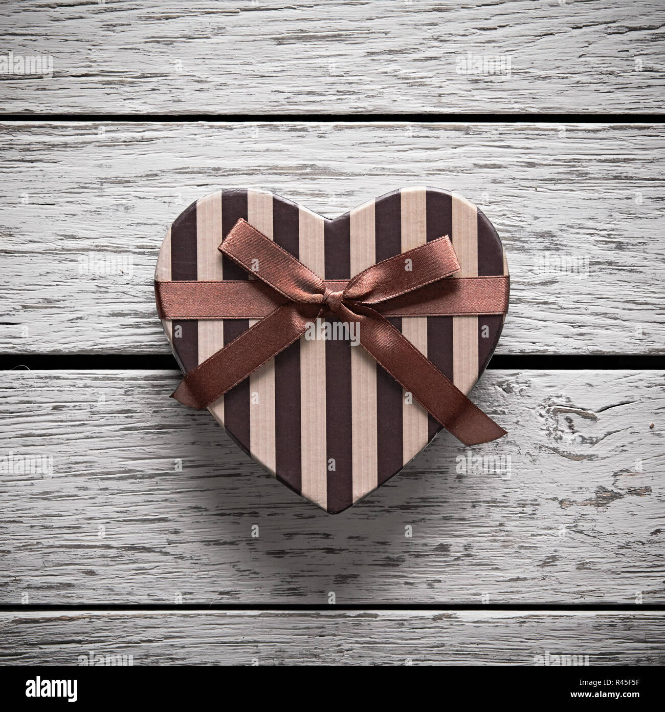 Heart shaped Valentines Day gift box Stock Photo - Alamy