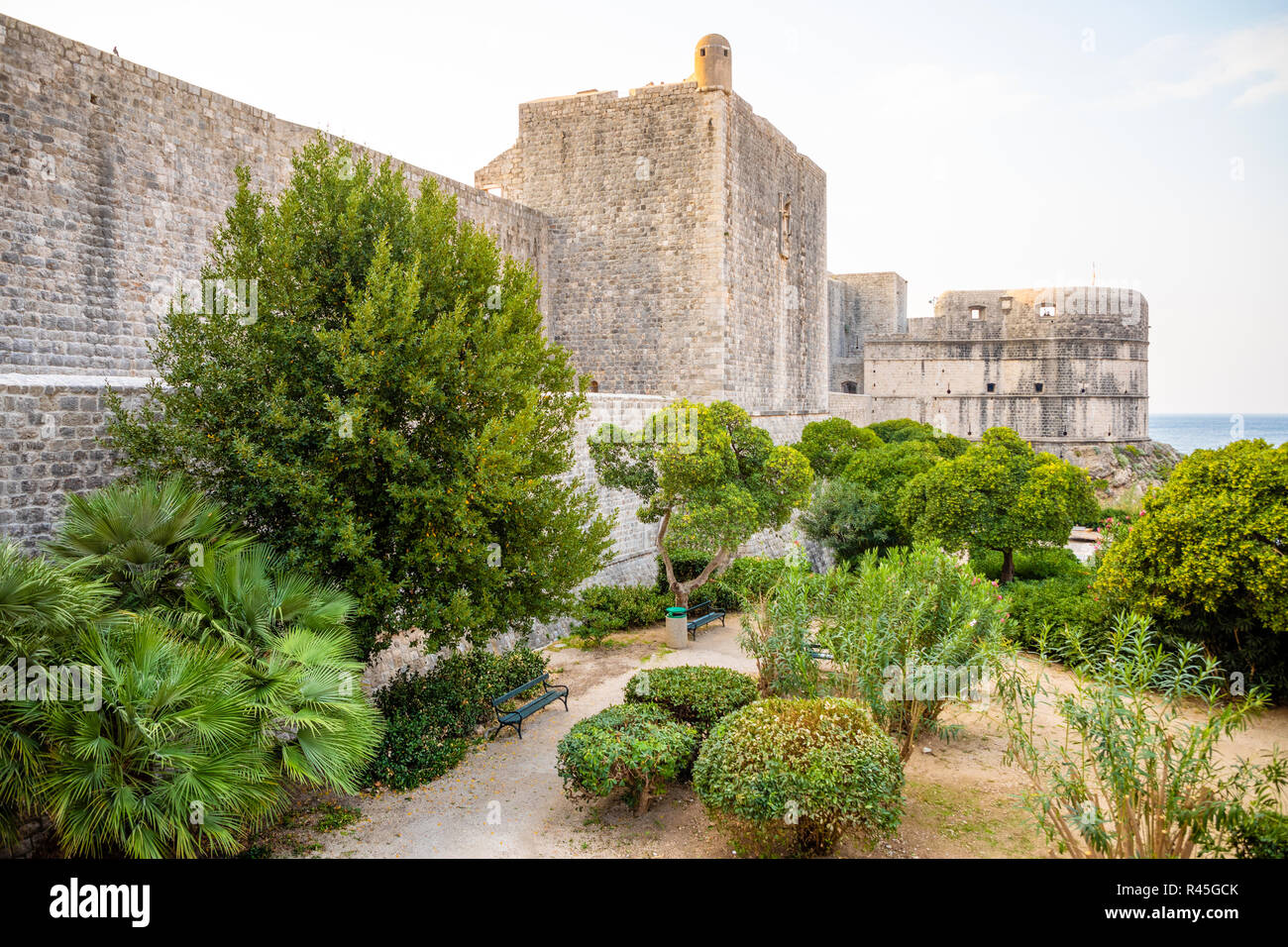 Minceta Tower and Dubrovnik medieval old town city walls at sunset time ...